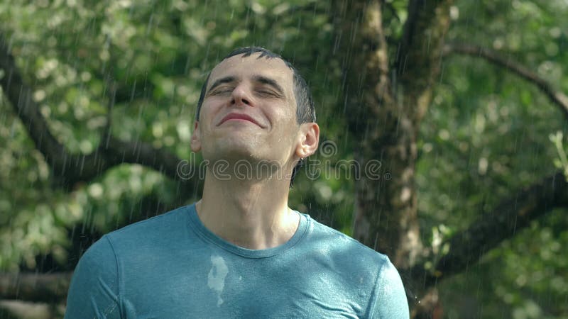 Happy Man Under Rain Raising Hands Stock Footage - Video of nature ...