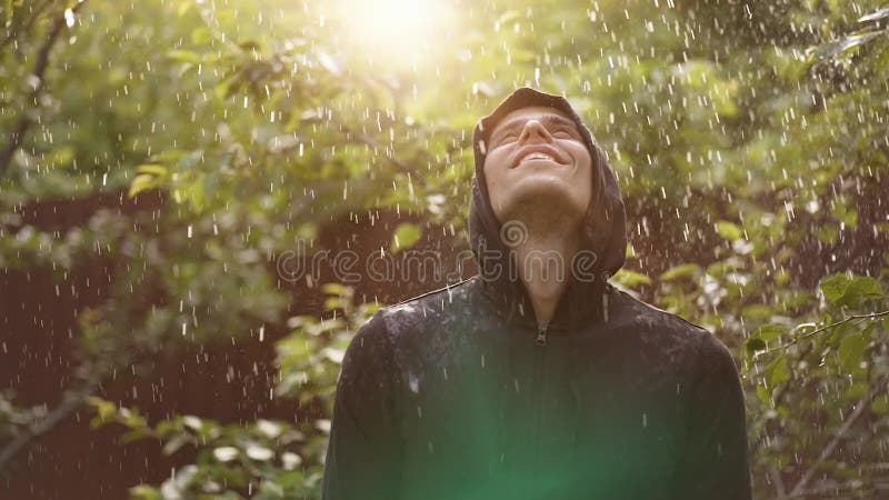 Happy Man Under Rain Raising Hands Stock Footage - Video of nature ...