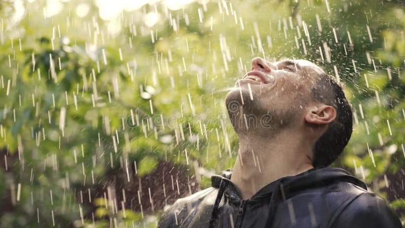 Happy Man Under Rain Raising Hands Stock Footage - Video of nature ...