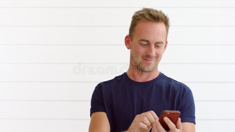 Happy Young Man Using 5g Phone Against a White Background with ...