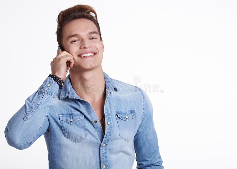 Happy Young Man Using Mobile Phone Isolated on White Background Stock ...