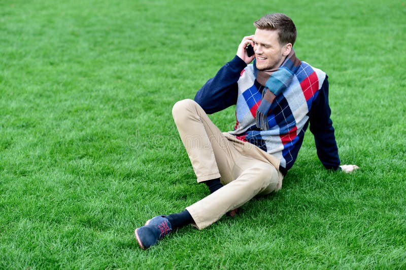 Happy Young Man Using Mobile Phone on Park Stock Photo - Image of ...