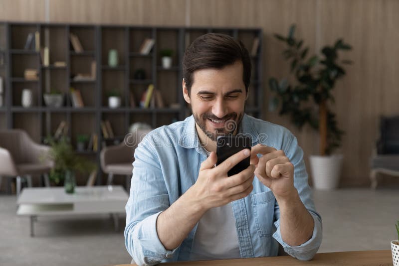 Happy Young Man Using Modern Technology Gadget. Stock Image - Image of ...
