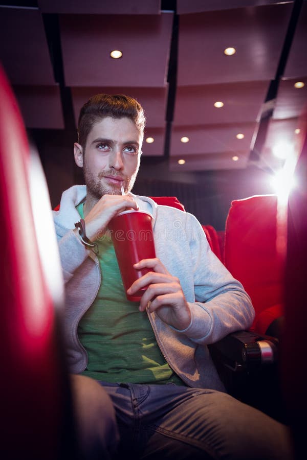Happy Young Man Watching a Film Stock Image - Image of interested ... Happy Young Man Watching a Film Stock Image - Image of interested ...