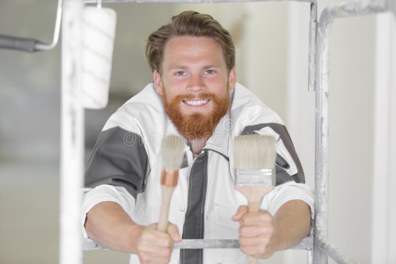 Happy young man at work stock image. Image of repair - 160407735