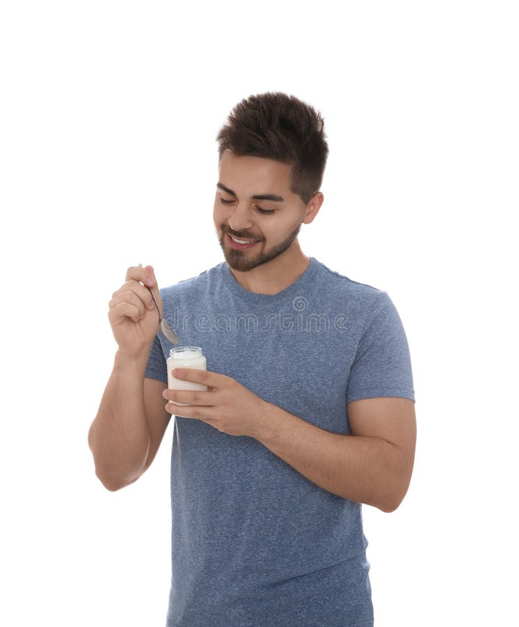 Happy Young Man with Yogurt and Spoon on Background Stock Image - Image ...