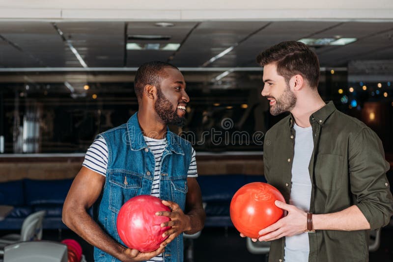 Happy young men with balls stock image. Image of competition - 129337697