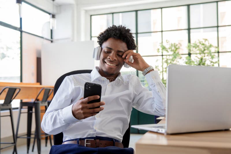 Happy Young Office Worker Using Phone and Having Fun Stock Photo ...