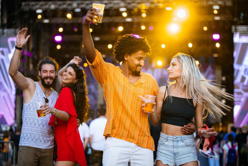 Happy Young People Attending Festivals at Summer Having Fun Stock Image ...