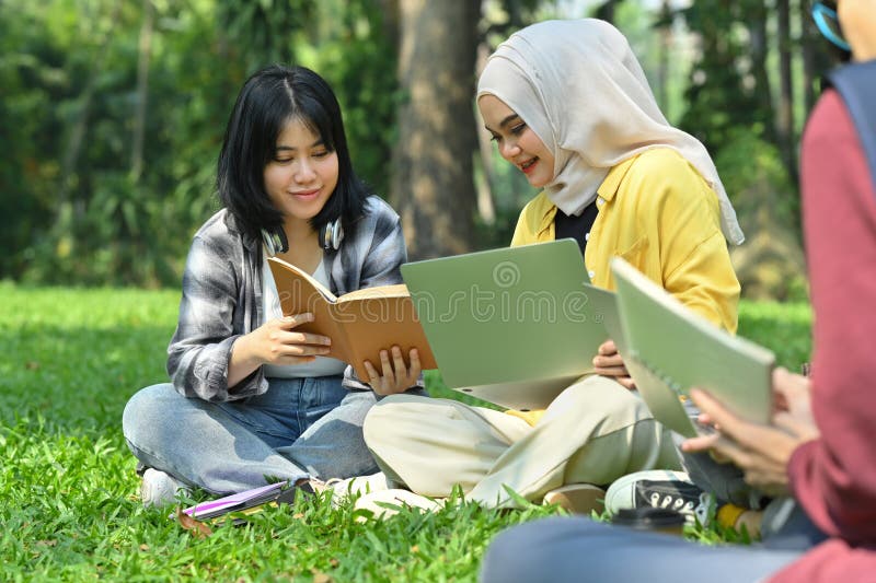 Happy Young People Doing Group Project, Preparing Presentation on ...