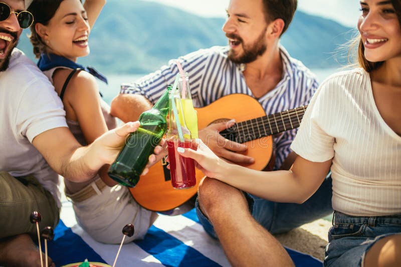 Young People Having Fun at Beach Party Stock Image - Image of guitar ...