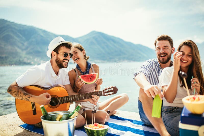 Young People Having Fun at Beach Party Stock Image - Image of laughing ...
