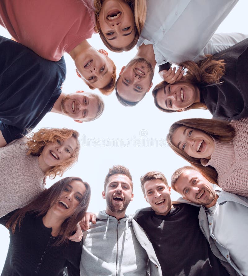 Happy Young People Standing in a Circle and Looking at the Camera Stock ...