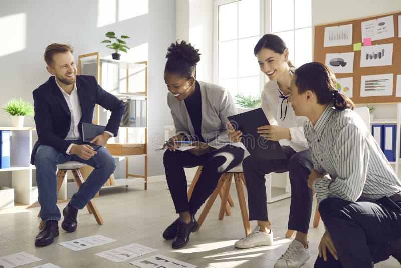 Happy Young People Working on Project, Analyzing Data and Having Fun in ...