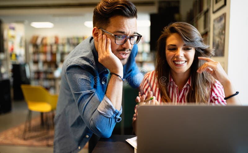 Happy Young People Working Together on Laptop. Teamwork, Study ...