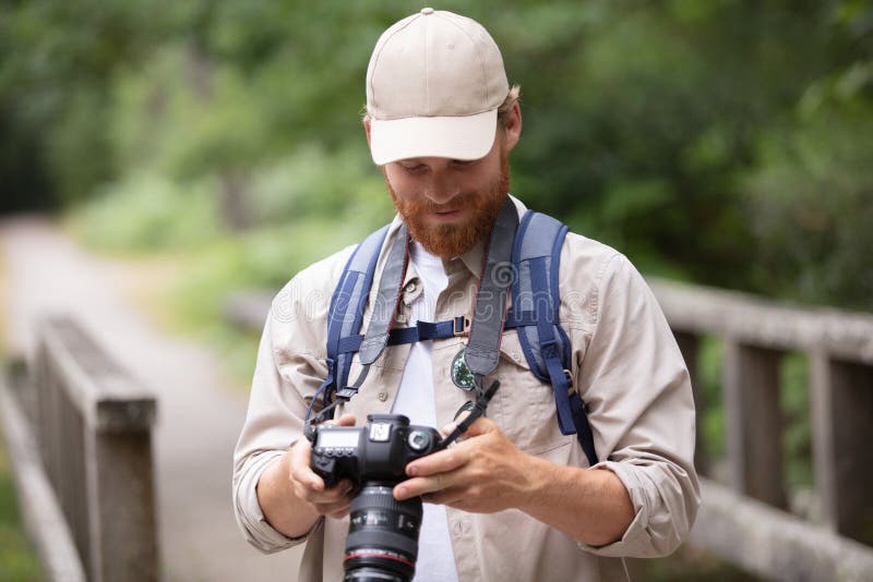 Happy Young Photographer in Casual Outfit with Camera Stock Image ...
