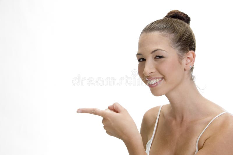 Happy Young Smiling Woman Pointing Picture. Image: 6618179