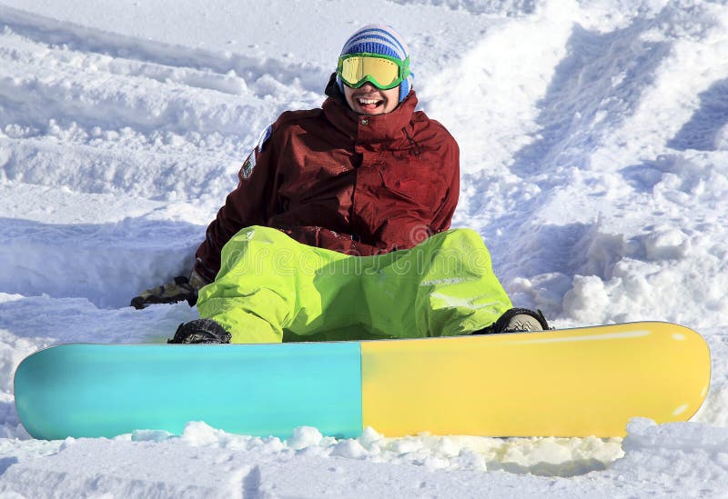 Happy young snowboarder stock photo. Image of face, clothing - 24312132