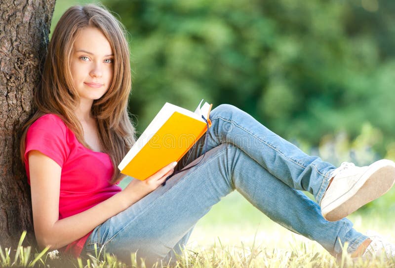 Happy Young Student Girl with Book Stock Image - Image of book, park ...