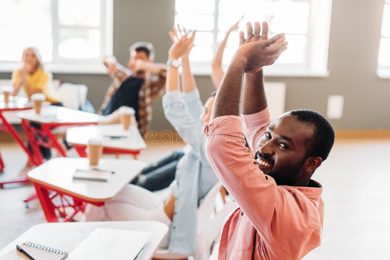 Students clapping hands stock photo. Image of session - 69089146