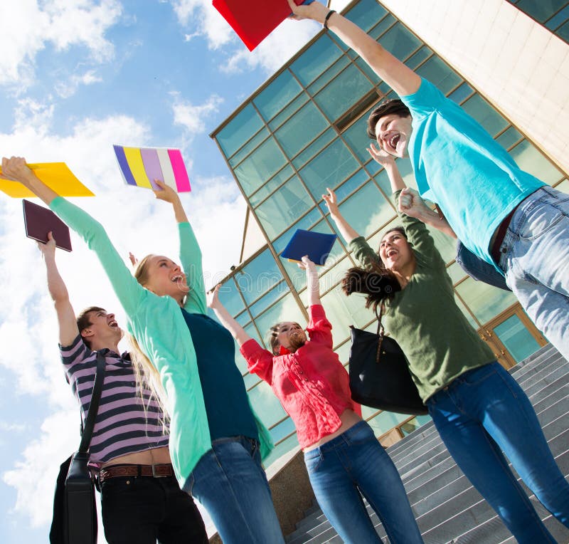 Happy Students Jumping for Joy after the Exam Stock Photo - Image of ...