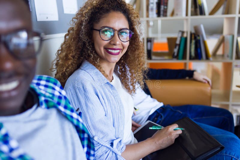 Happy Young Students Looking at Camera in a University. Stock Image ...