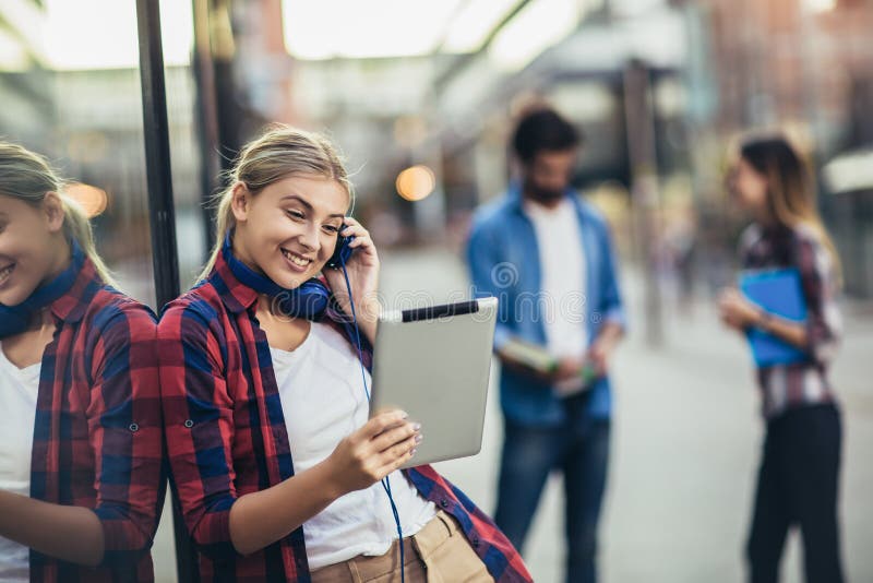 Young University Students Friends Studying Using Digital Tablet Stock ...
