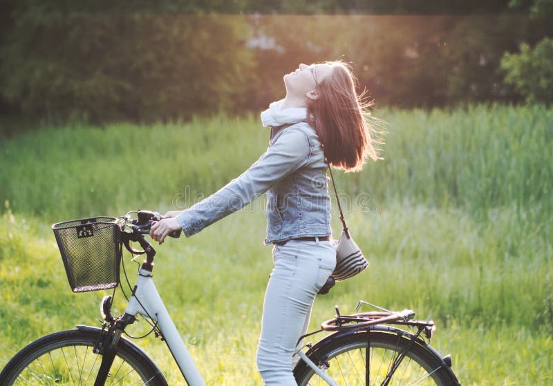 Happy Young Woman on Bicycle in Spring Stock Photo - Image of bike ...