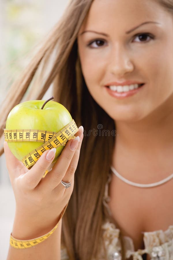 Happy young woman on diet stock image. Image of casual - 11200251