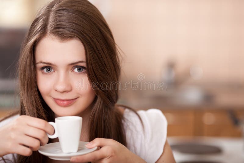 Happy Teen Girl Drinking Coffee at Home Stock Photo - Image of coffee ...