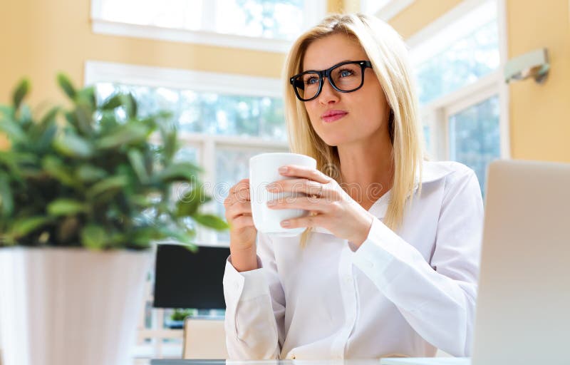 Happy Young Woman Drinking Coffee Stock Photo - Image of businesswoman ...