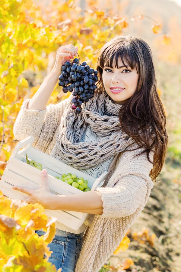 Happy Young Woman with Grape in Hand Stock Photo - Image of female ...