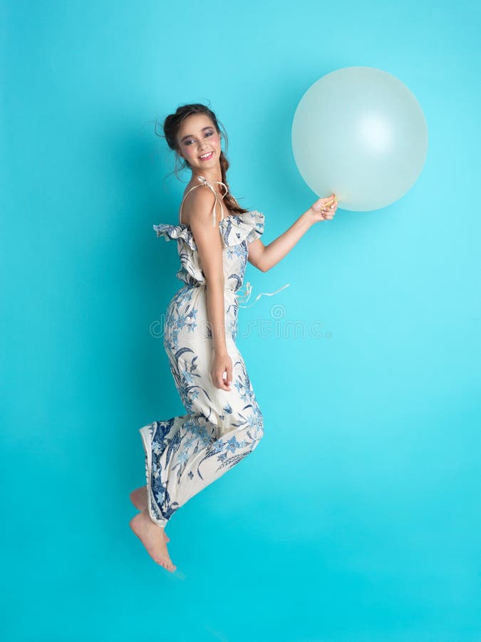 Happy Woman Jumping with Big, White Balloon Stock Image - Image of ...