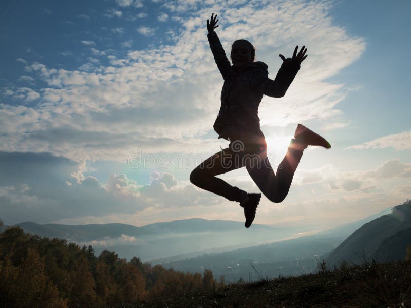 Happy Young Woman Jumping at the Sunset Stock Image - Image of passion ...