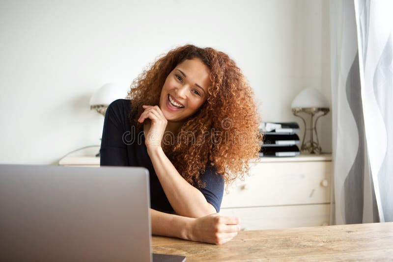 Happy Young Woman with Laptop Computer at Home Stock Photo - Image of ...