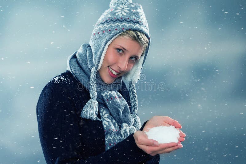 Happy Young Woman Presenting Hand Full of Snow Stock Photo - Image of ...