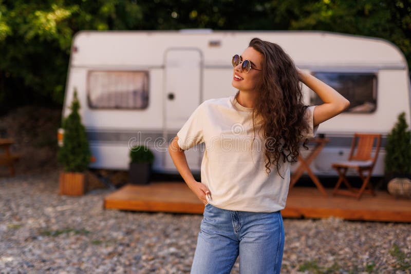Happy Young Woman Sitting with in Front of Her Camper Van during a Trip ...