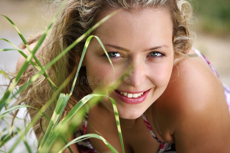 Happy young woman smiling stock photo. Image of relaxed - 23582468