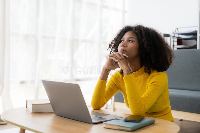 Cheerful Young Black Woman Excited Using Laptop Computer on Sofa at ...
