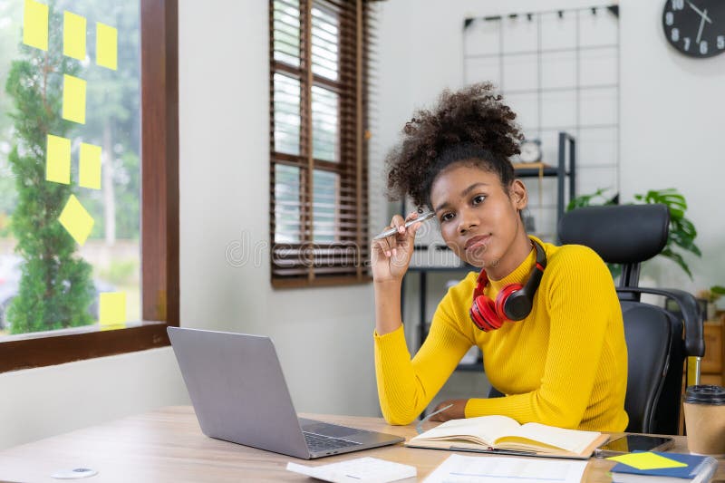Cheerful Young Black Woman Excited Using Laptop Computer on Sofa at ...