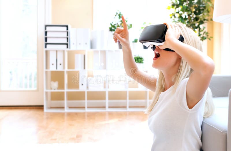 Happy Young Woman Using a VR Headset Stock Image - Image of point ...