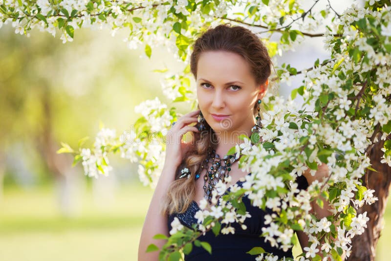 Beautiful Woman in a Spring Garden Stock Photo - Image of female ...