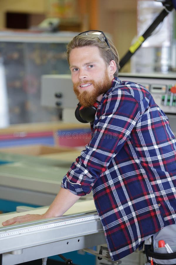 Happy Young Working Man Looking at Camera Stock Photo - Image of ...