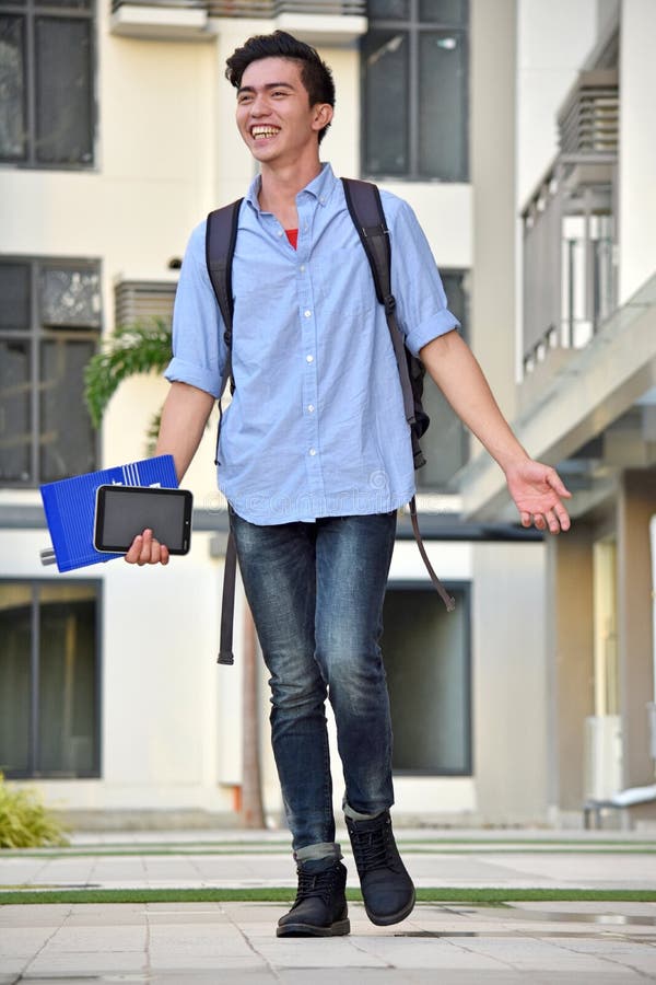Happy Youthful Diverse Student with Books Walking on Campus Stock Image ...