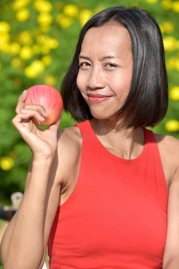 Happy Youthful Female with an Apple Stock Image - Image of apple, young ...