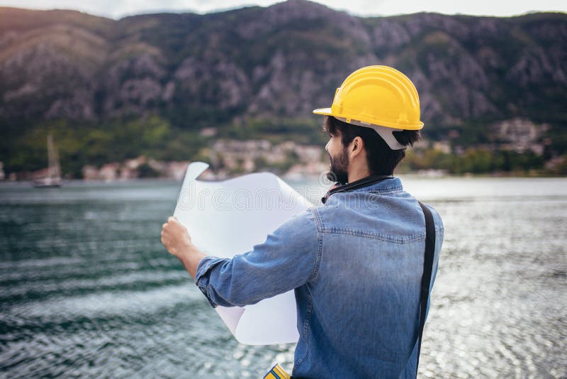 Harbor Engineer Holding the Paper, Construction Work Stock Photo ...