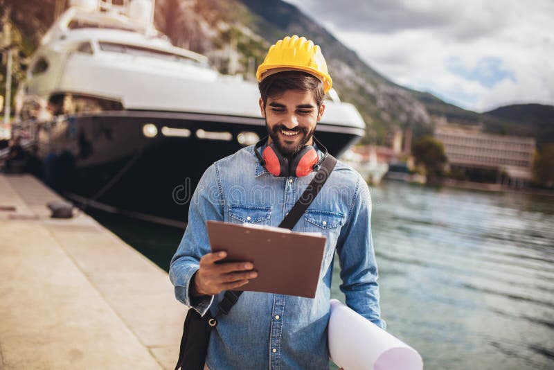 Harbor Engineer Holding the Paper, Construction Work Stock Photo ...