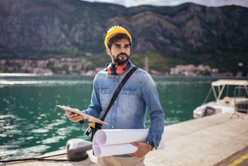 Harbor Engineer Holding the Paper, Construction Work Stock Photo ...