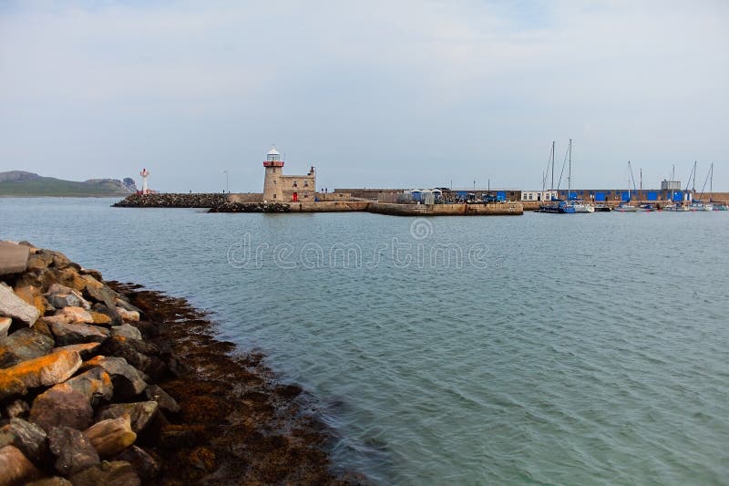 Howth Lighthouse. Harbor and Marina in Cloudy Day in Howth, Dublin ...