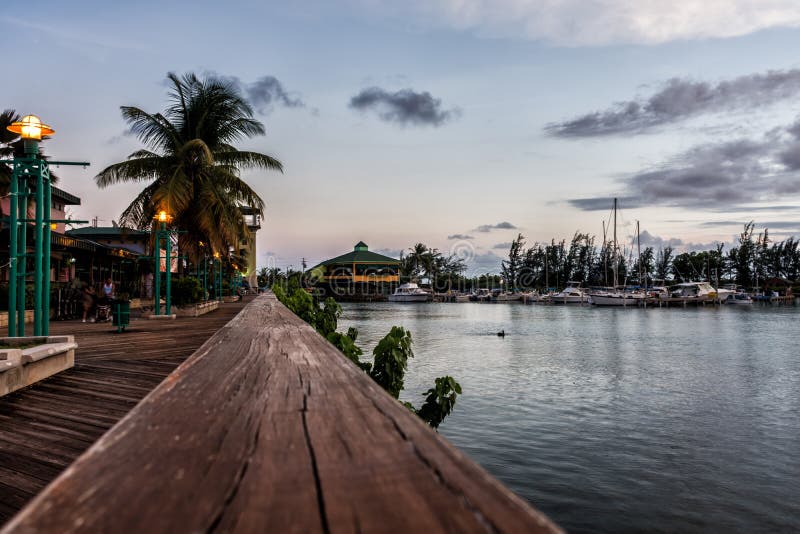 Harbor sunset stock image. Image of lake, clouds, boats - 78576829